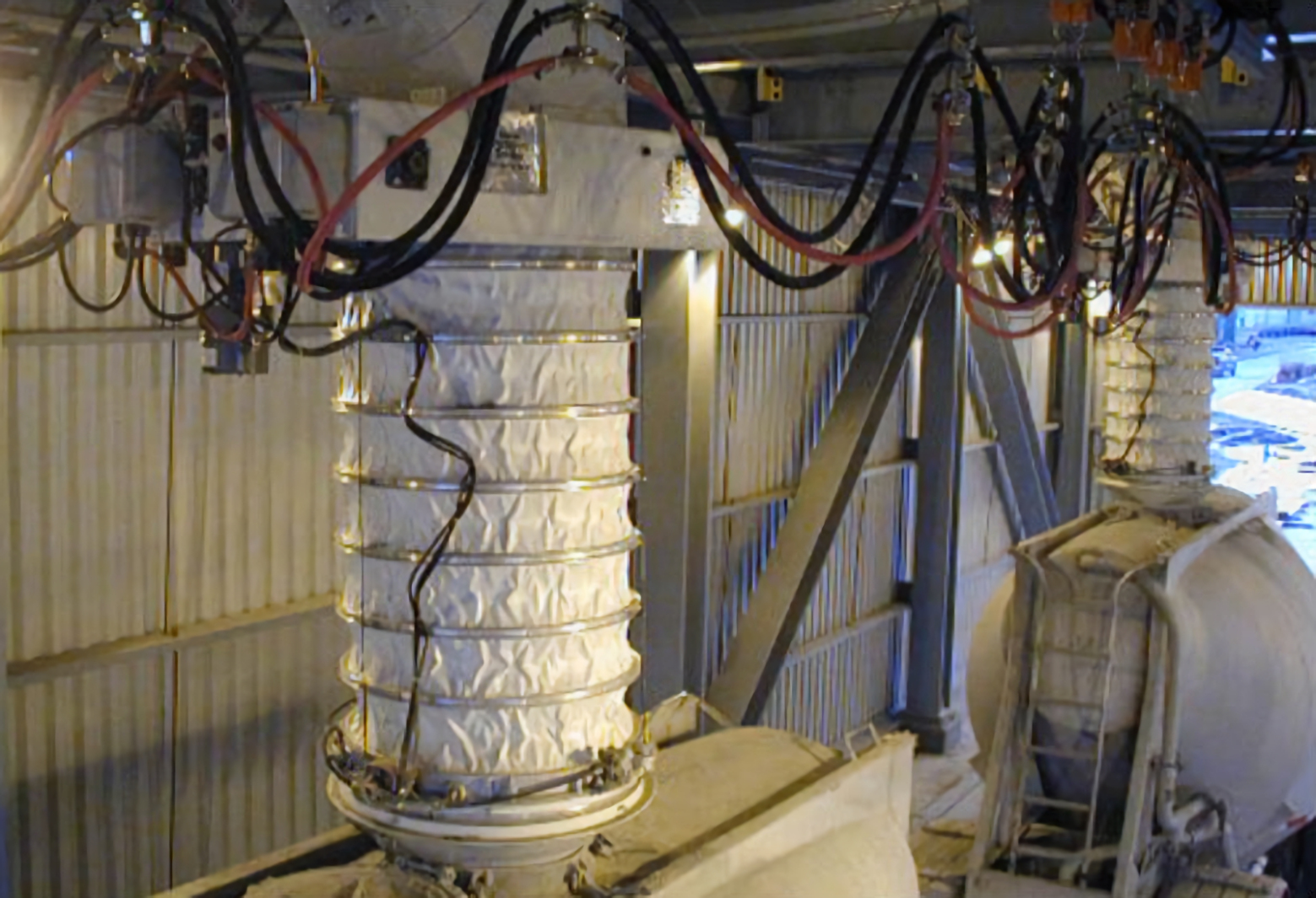 Dust Free Loading Spouts by MIDWEST – PROMAT Engineering Sales (2003) Inc.